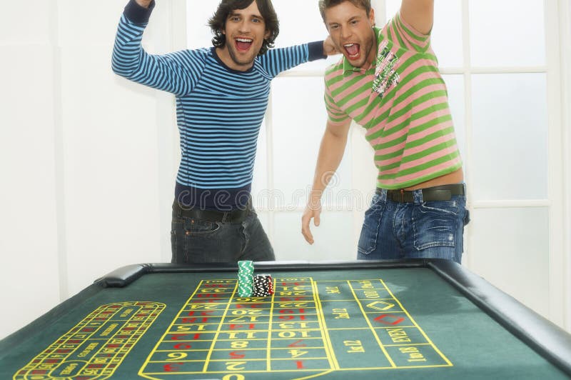 Men Celebrating at Roulette Table Stock Image - Image of gambler ...