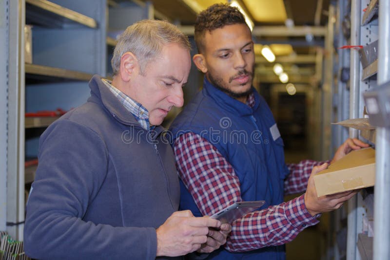 Men Checking Goods in Warehouse Stock Image - Image of person, factory ...