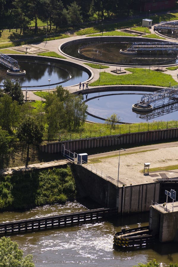 Men Checking Water Tanks at Sewage Treatment Plant Stock Image - Image ...