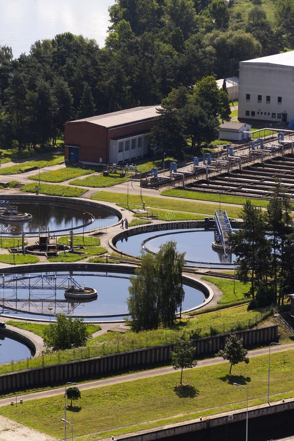 Men Checking Water Tanks at Sewage Treatment Plant Stock Photo - Image ...