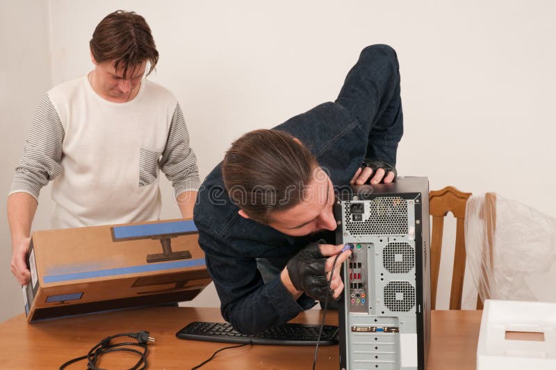 Men and the computer. stock photo. Image of debug, works - 13156996