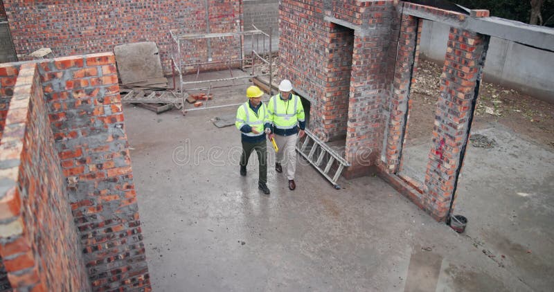 Men, Construction Site and Walking with Tool for Inspection or Check ...