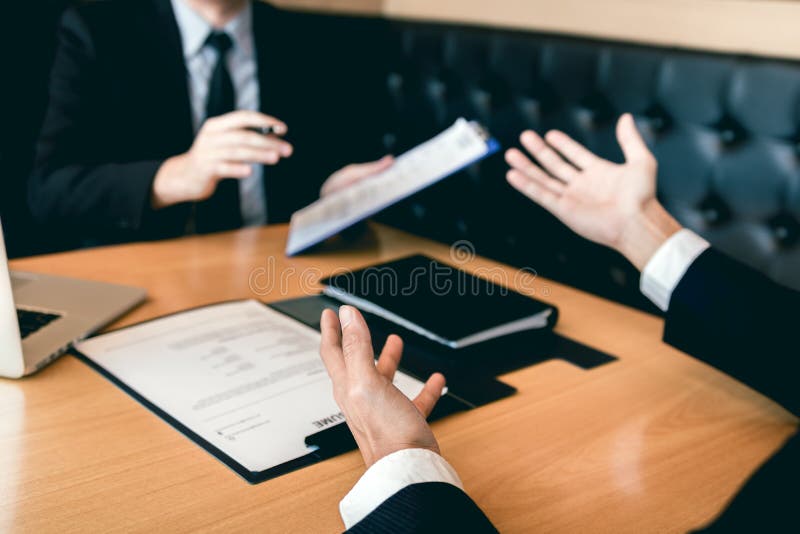 Men are Describing the Employment History of the Employer about His ...