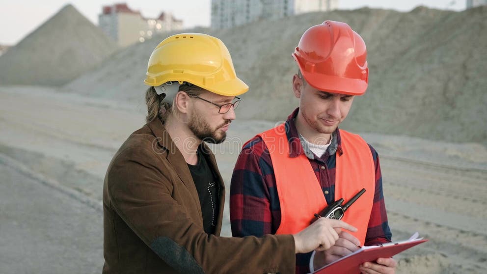 Men Discuss about Work Process on Site Stock Image - Image of ...