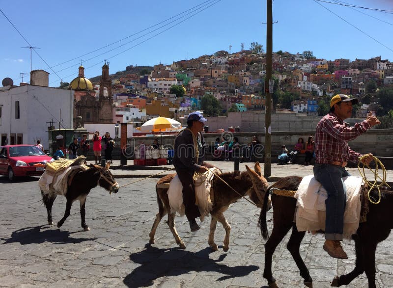 Men on donkeys editorial photography. Image of stone - 58263512
