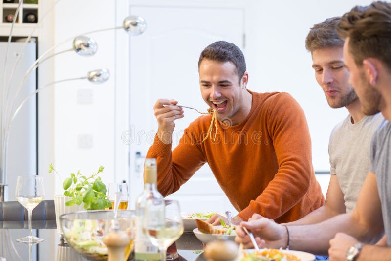 Men Eating Lunch stock image. Image of house, cheerful - 72931499
