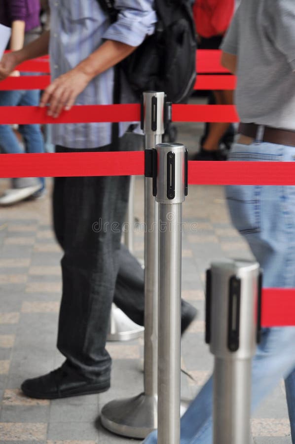Men enter and exit queue stock photo. Image of ticket - 7716974
