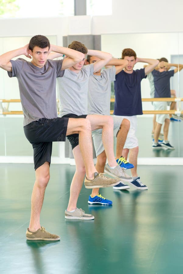 Men exercising in gym stock photo. Image of cardio, synchronised ...