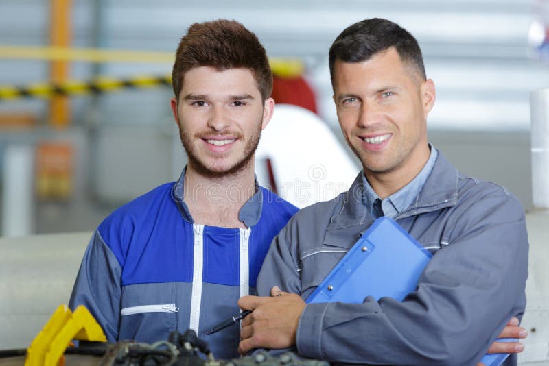 Men factor workers posing stock photo. Image of manufacture - 148698740