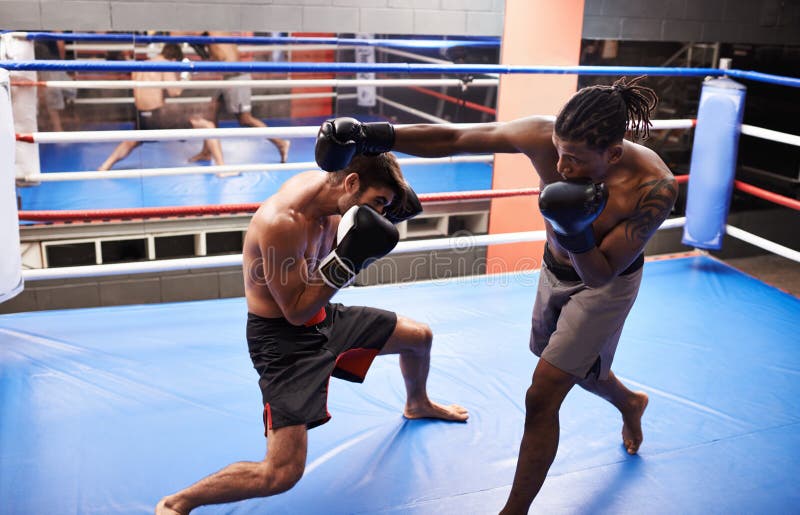 Men, Fighting and Boxing Ring with Punch for Competition in Gym for ...