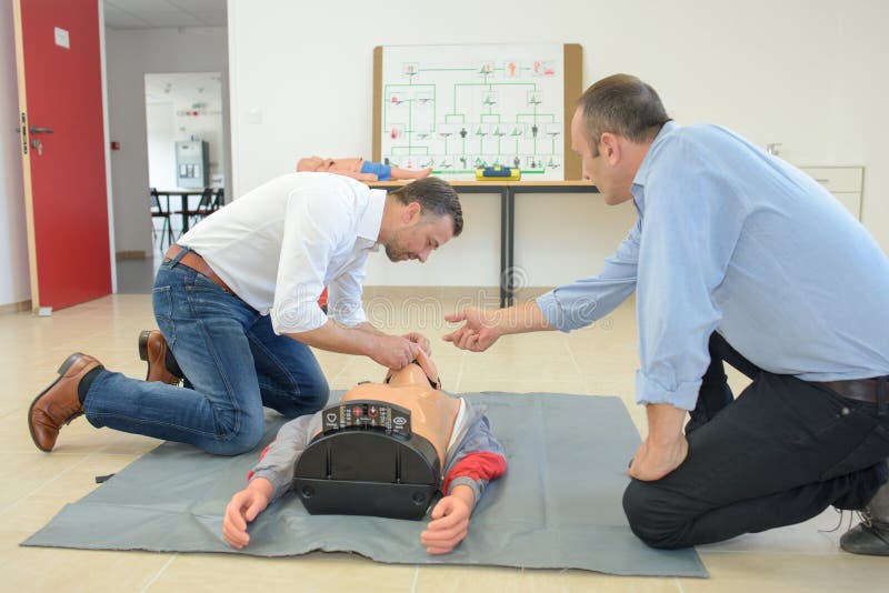 Men during First Aid Course Stock Photo - Image of mannequin, caregiver ...