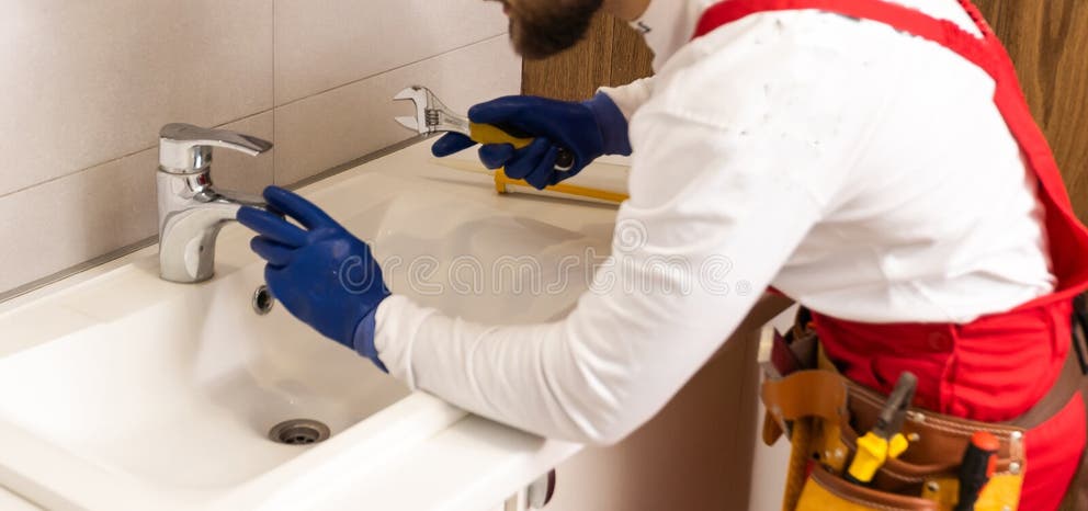 Men Fixing a Sink in Bathroom Stock Photo - Image of leak, repairer ...