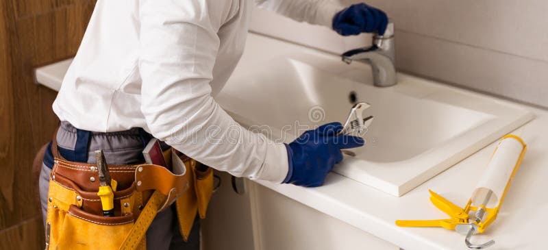 Men Fixing a Sink in Bathroom Stock Image - Image of joining, worker ...
