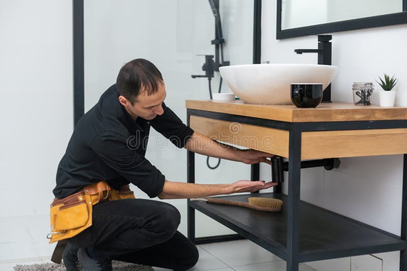 Men Fixing a Sink in Bathroom Stock Photo - Image of wrench ...