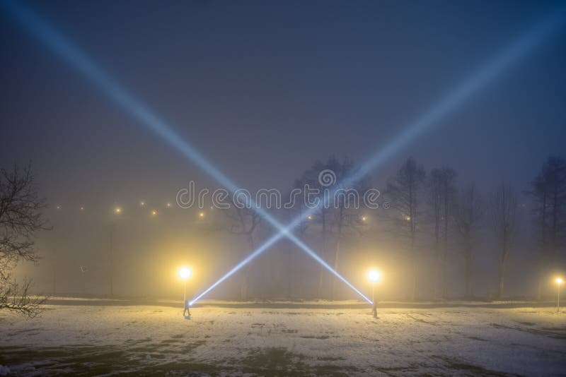 Men flashlights at night. stock photo. Image of light - 111683748