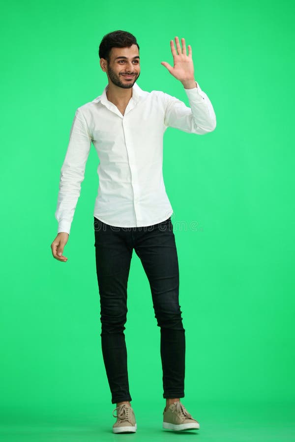 Men on Green Background in White Shirt Waves Hello Stock Photo - Image ...
