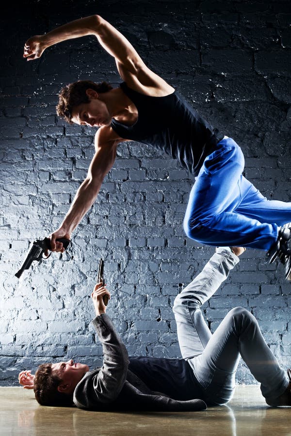 Men with guns fighting stock photo. Image of action, caucasian - 23756980