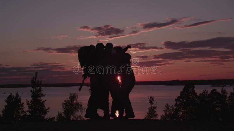 Men with Guns at Sunset. Shot with Red Camera Stock Footage - Video of ...