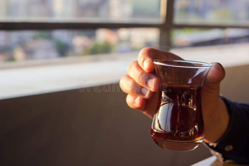 Men Hand Holding Traditional Turkish Tea Glass during Drinking it Stock ...