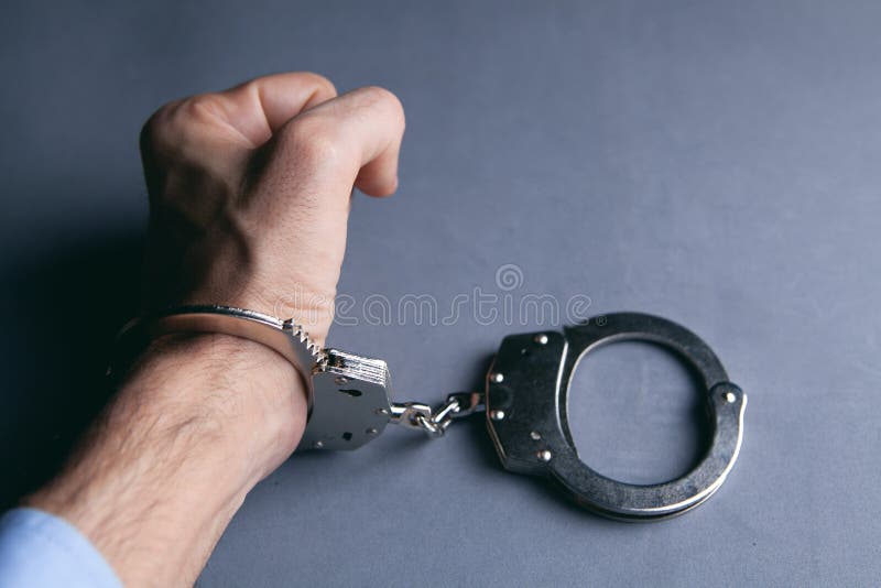 Handcuffed Criminal stock image. Image of arrested, offender - 10941527