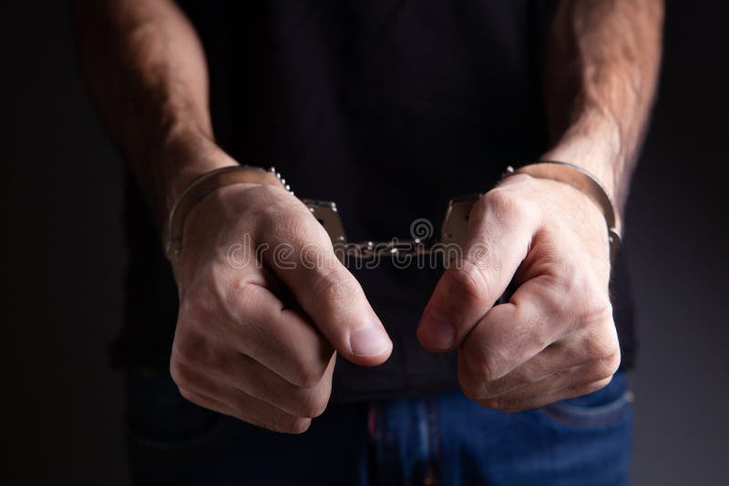 Handcuffed Criminal stock image. Image of arrested, offender - 10941527