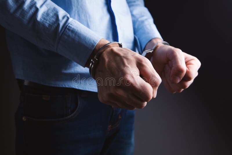 Handcuffed Criminal stock image. Image of arrested, offender - 10941527