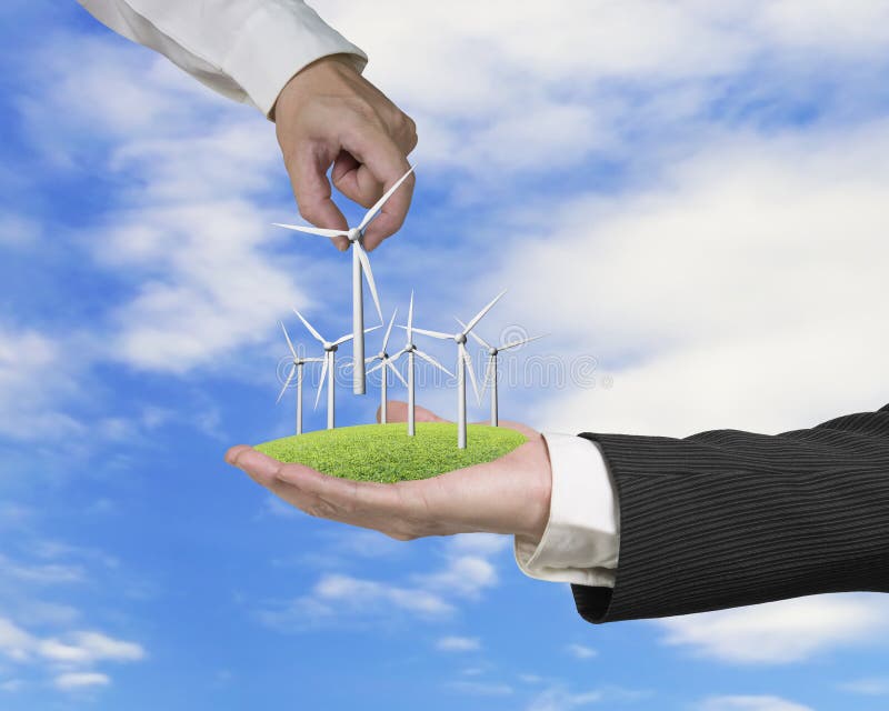 Men Hands Holding Windturbines on Meadow Stock Image - Image of ...