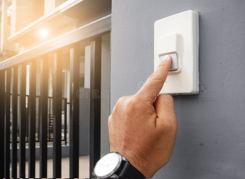 Hands press the doorbell. stock image. Image of sunny - 102682597