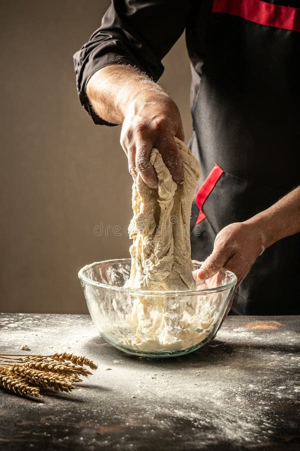 Man Preparing Bread Dough on Wooden Table in a Bakery Close Up ...