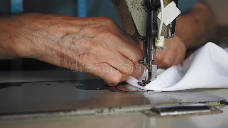 Slow Motion of Men Hands Using a Sewing Machine . Stock Footage - Video ...