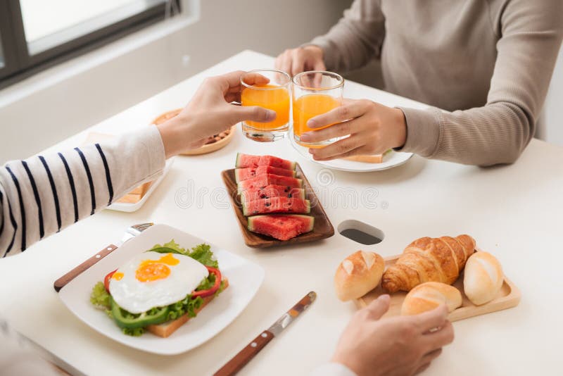 Men Having Breakfast with Toasts at Table Stock Image - Image of ...