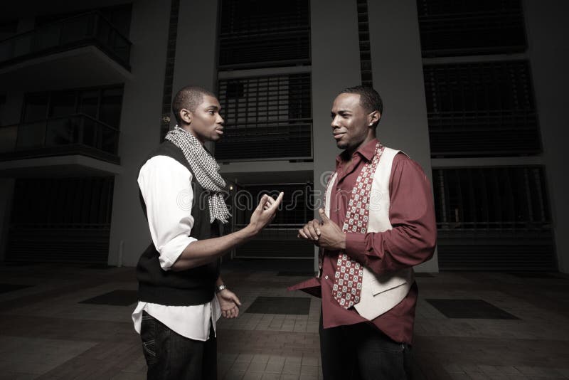 Conversation of Two Boys on the Grass Stock Photo - Image of confident ...