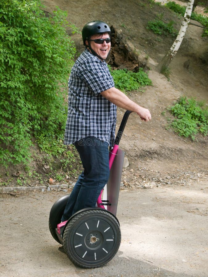 Man riding Segway stock image. Image of driving, human - 277825