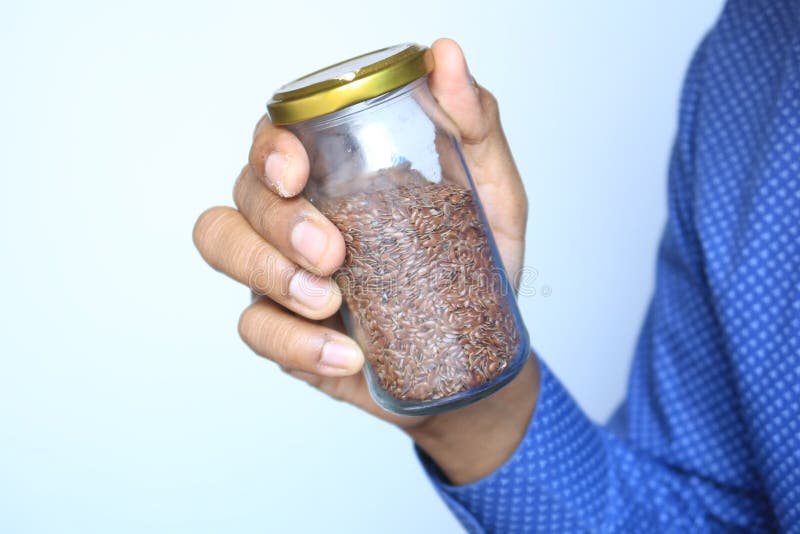 Men Holding a Chia Seed Jar Stock Photo - Image of ingredient, estonia ...