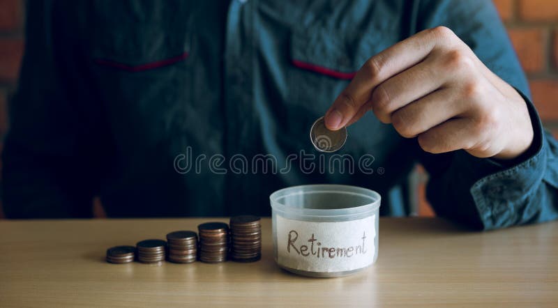 Men are Holding Coins Dropping To the Money Box with the Concept of ...