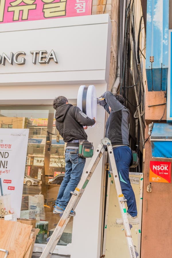 Installing Signage Stock Photos - Free & Royalty-Free Stock Photos from ...