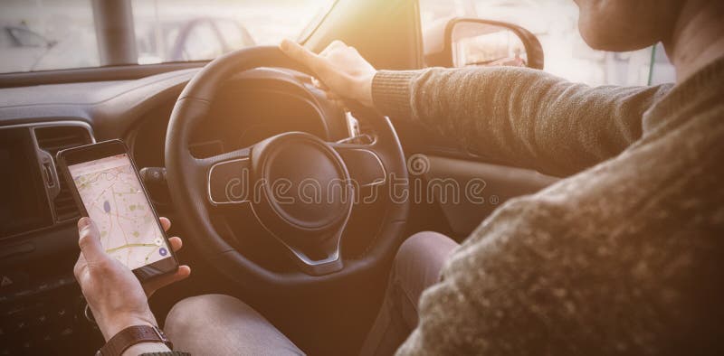 Men Looking at GPS on His Phone Stock Photo - Image of horn, phone ...