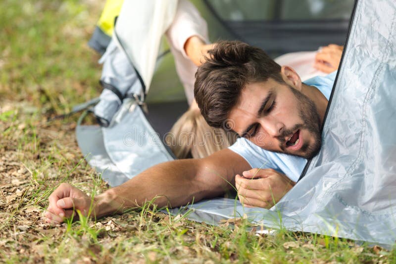 Man lying in tent stock photo. Image of spring, moutains - 197678652
