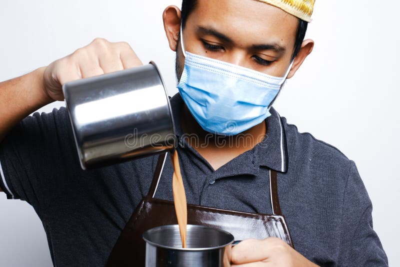 Men making teh tarik stock image. Image of calories - 190786181