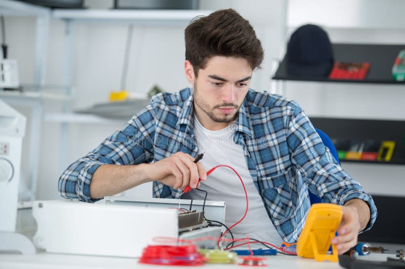 Men and Measurement Voltage Stock Image - Image of electrician ...