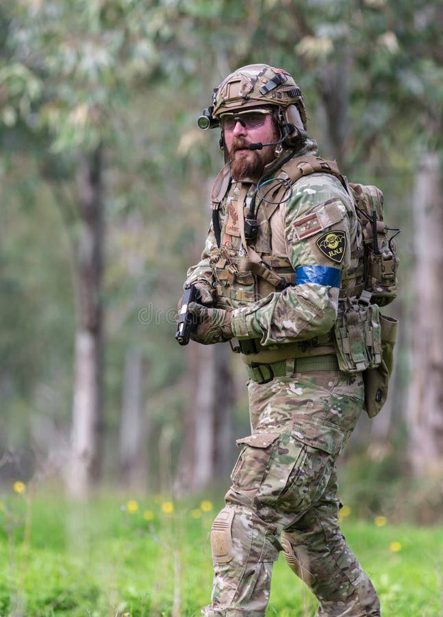 Men in Military Uniform with Weapon Editorial Photo - Image of uniform ...