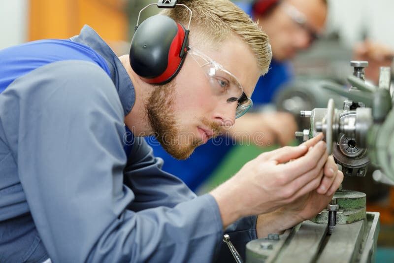 Man operating machine stock image. Image of technician - 160406795