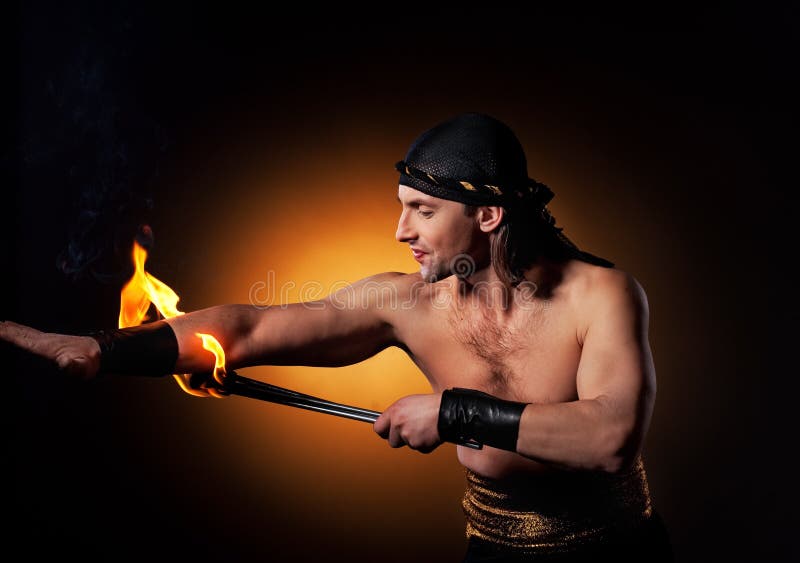 Man eating fire editorial stock photo. Image of fireeater - 83779393