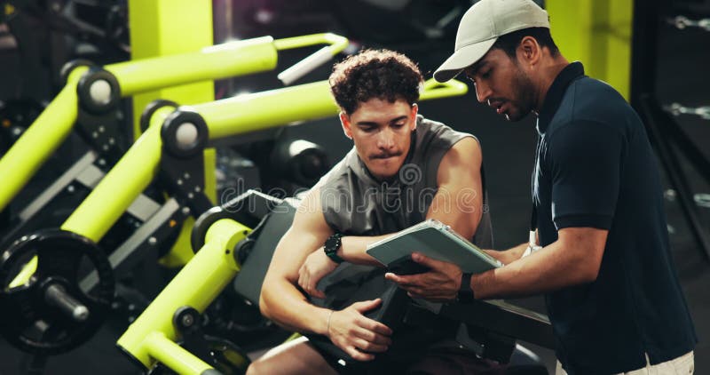 Men, Personal Trainer and Tablet with Machine for Workout Routine ...