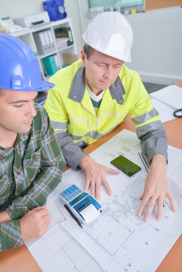 Men planning in office stock image. Image of plan, numbers - 270025879