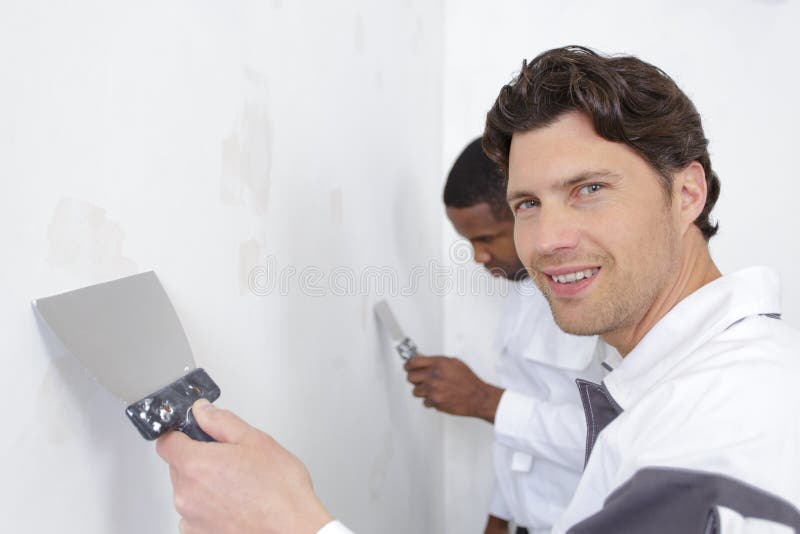 Man plastering wall stock image. Image of finishing - 237592659