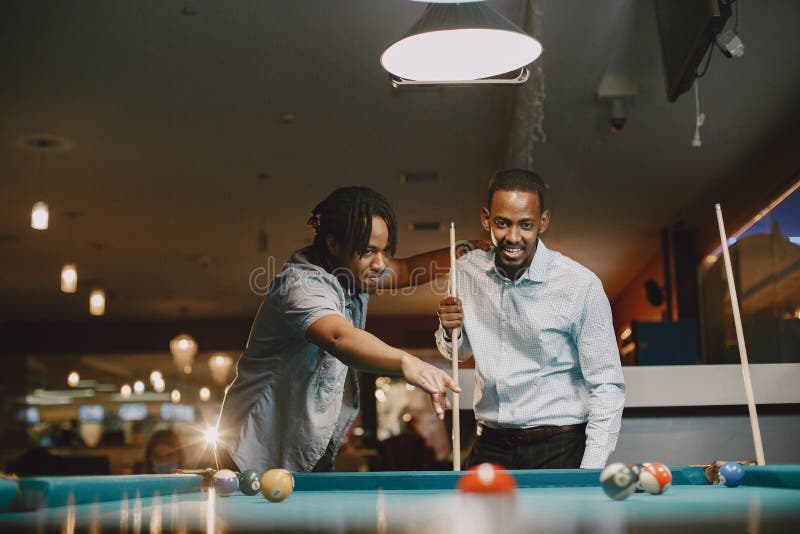 Man Playing Billiards in a Club Stock Photo - Image of drink, action ...
