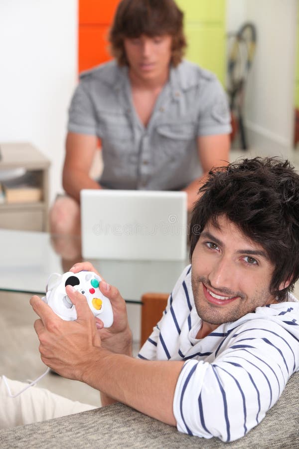 Men playing computer games stock image. Image of control - 28721777