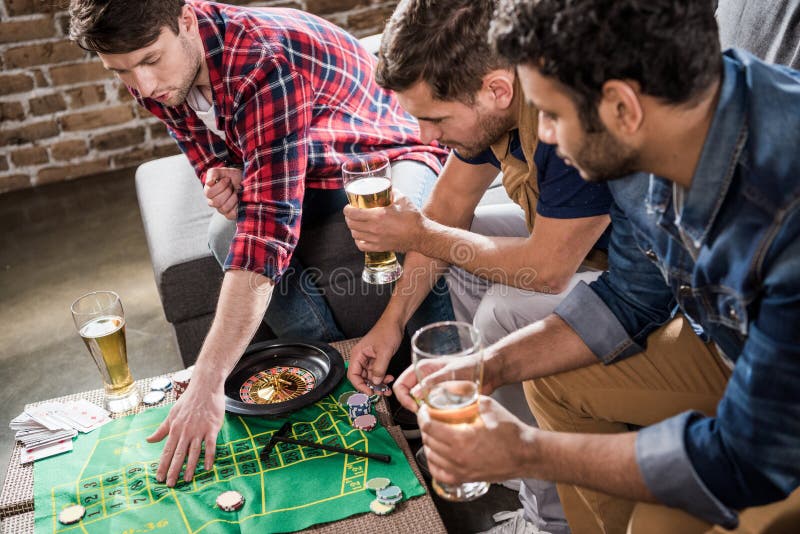 Men playing roulette game stock image. Image of chance - 93100141