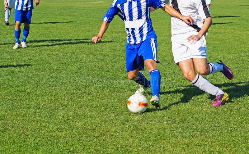 Men are playing soccer stock image. Image of green, playing - 61792959